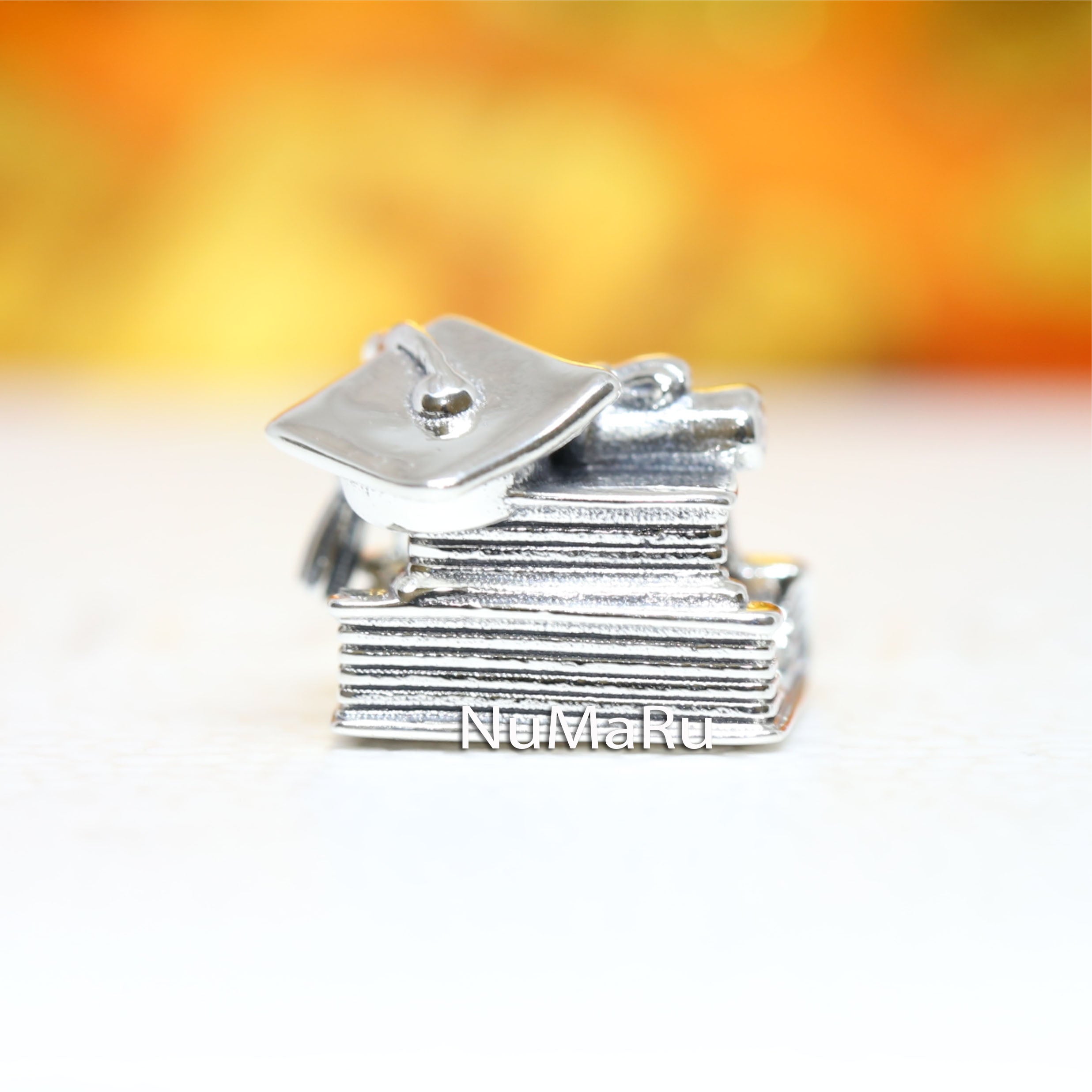 2023 Graduation Charm – NUMARU