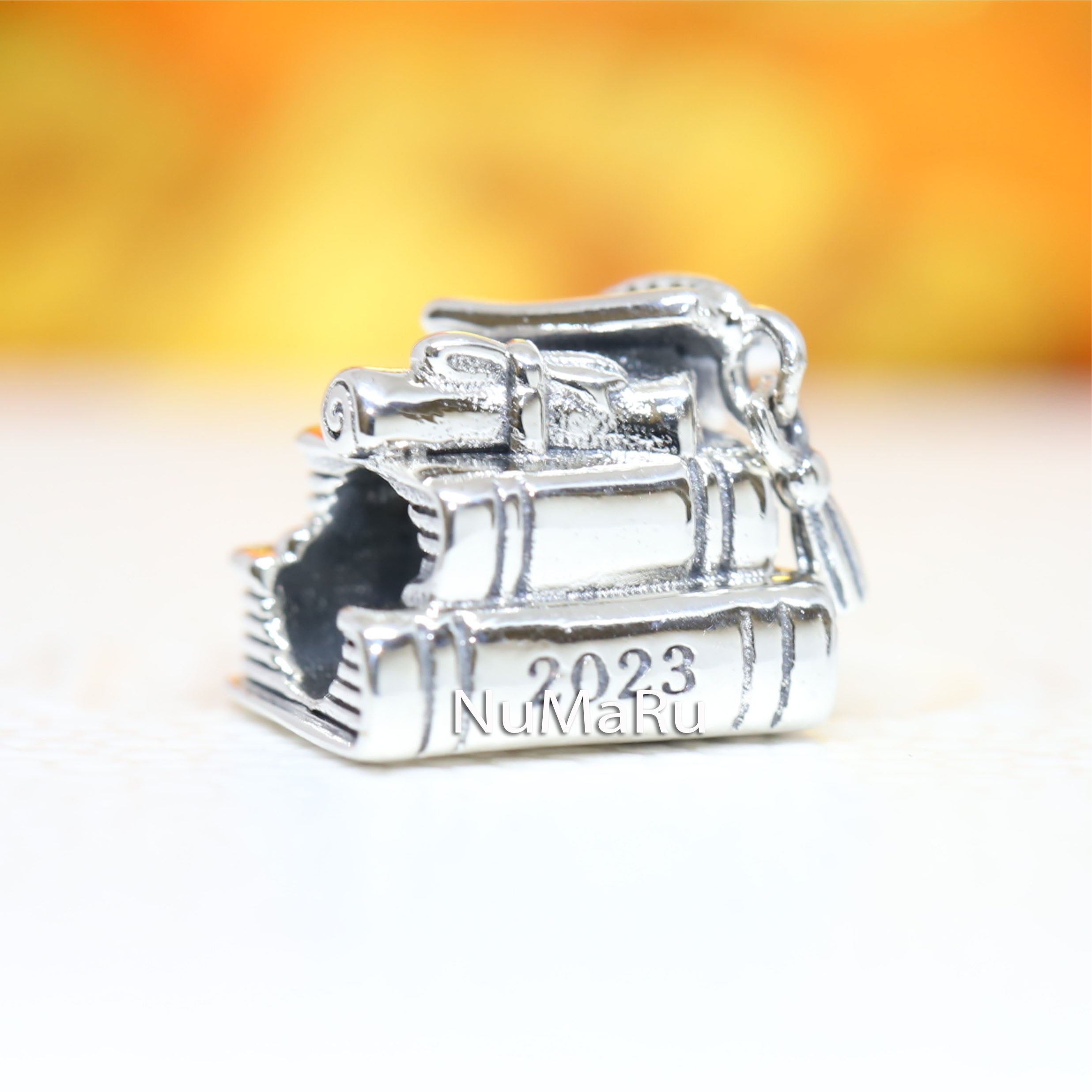 2023 Graduation Charm – NUMARU