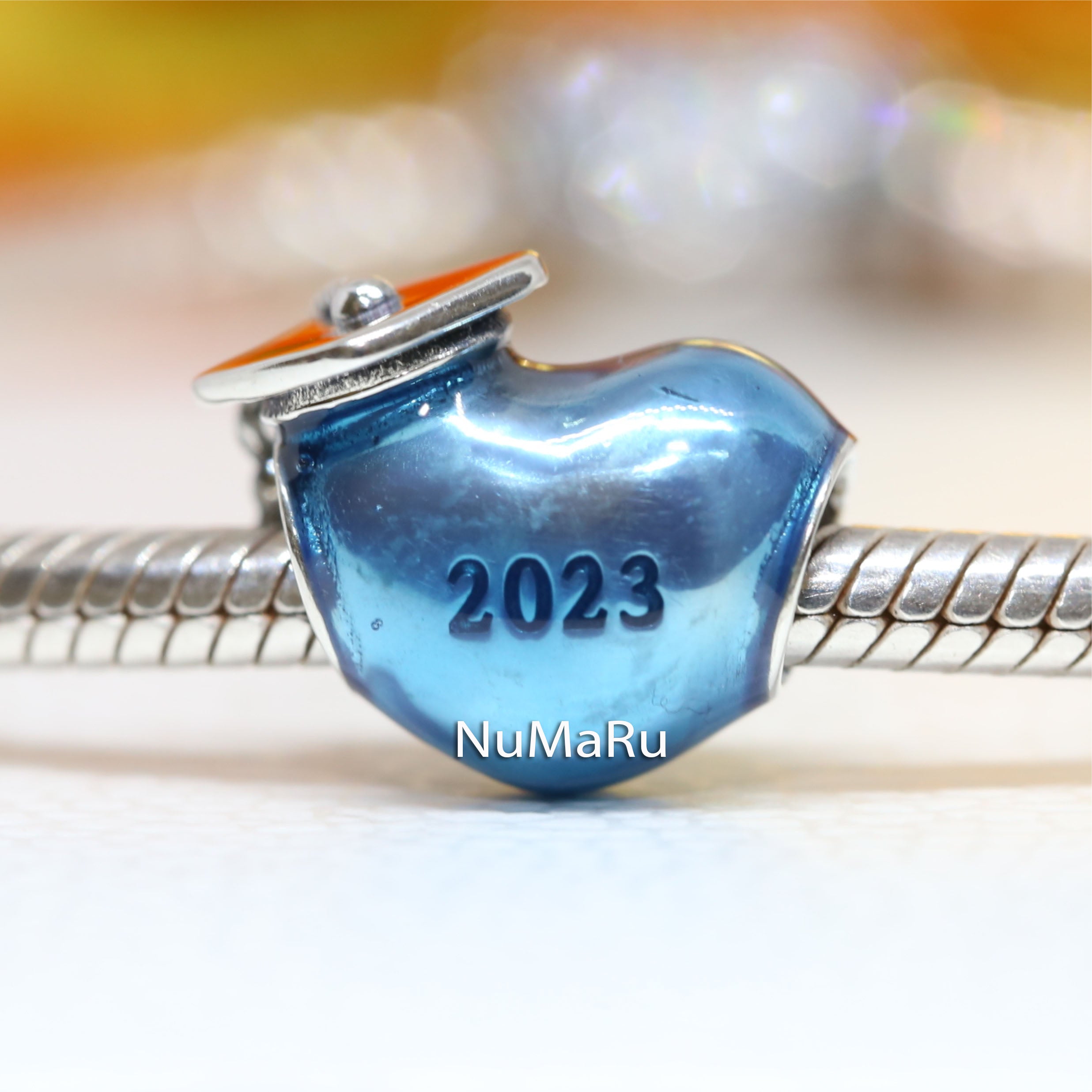Blue 2023 Graduation Heart Charm 792590C01 – NUMARU
