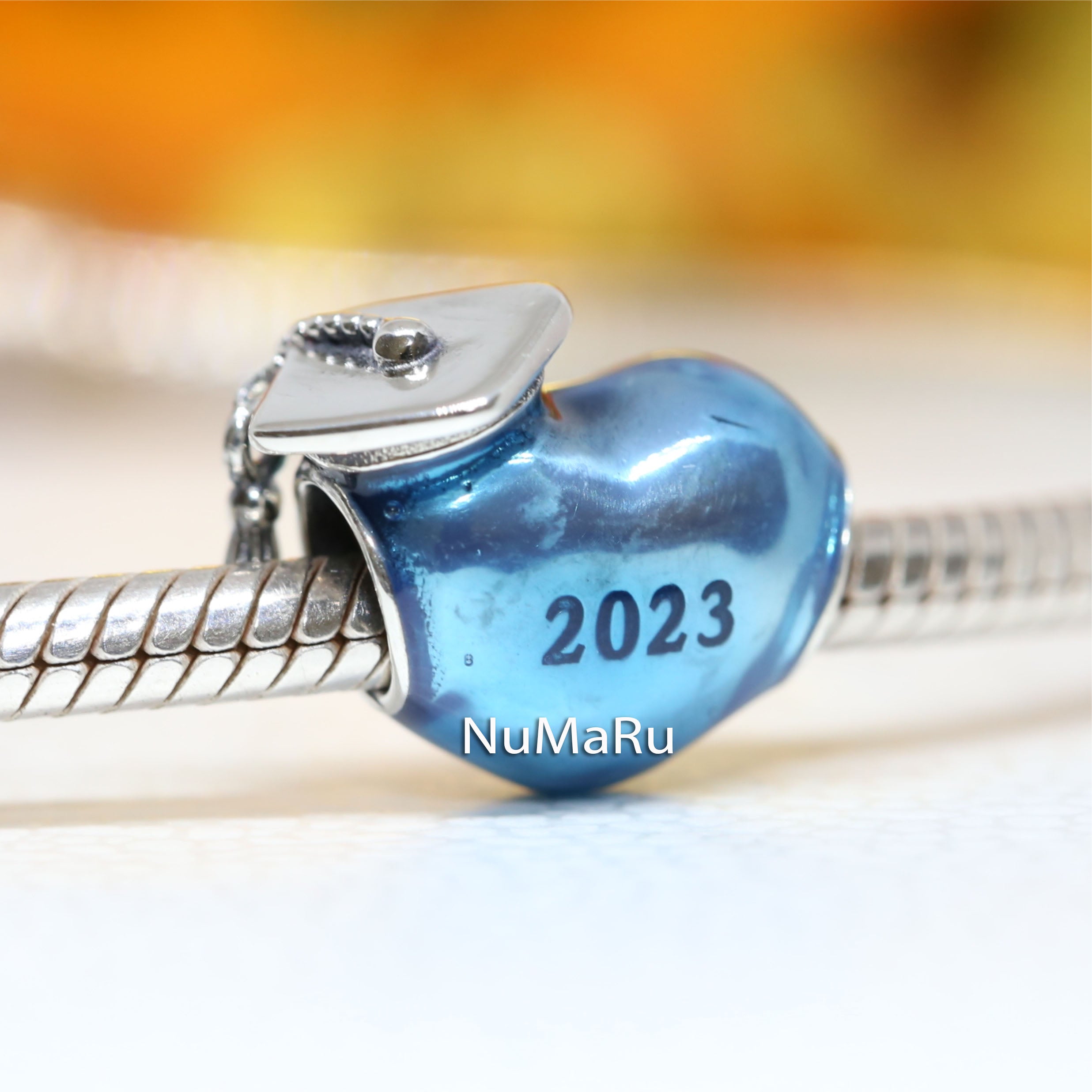 Blue 2023 Graduation Heart Charm 792590C01 – NUMARU