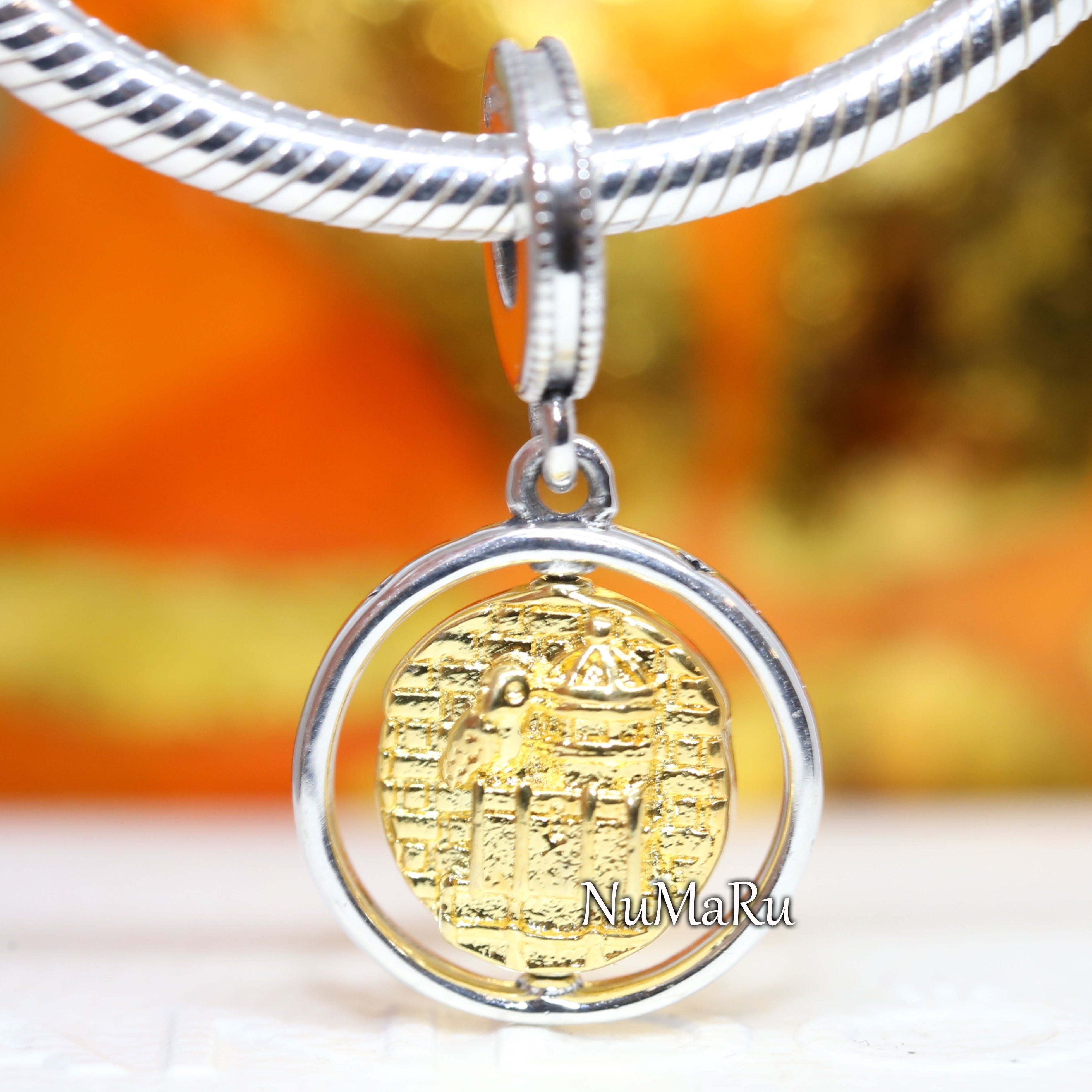 Hedwig Spinning Dangle Charm 760035C00 – NUMARU